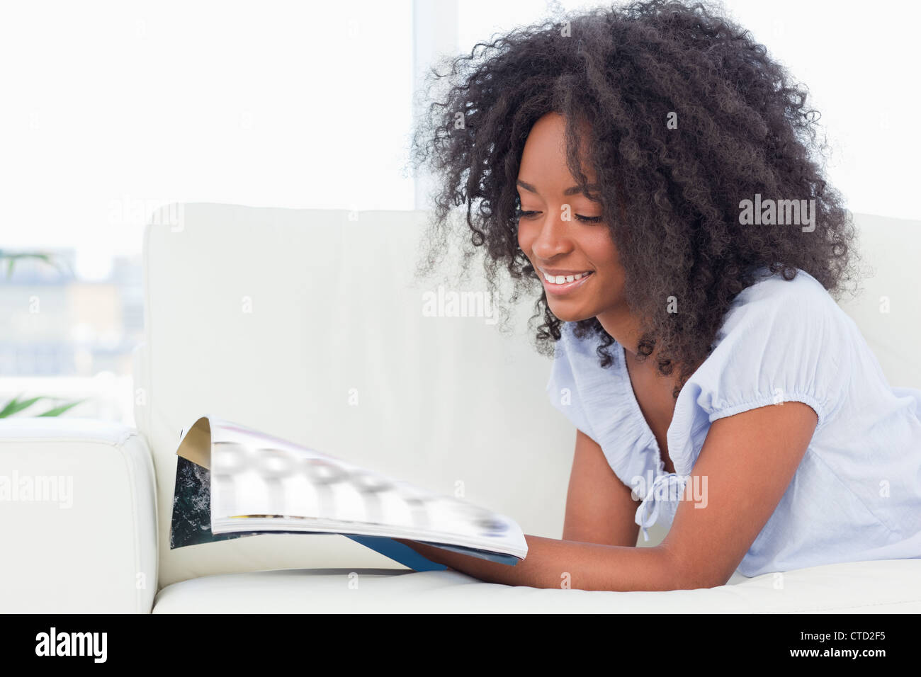 woman reading a magazine Stock Photo - Alamy