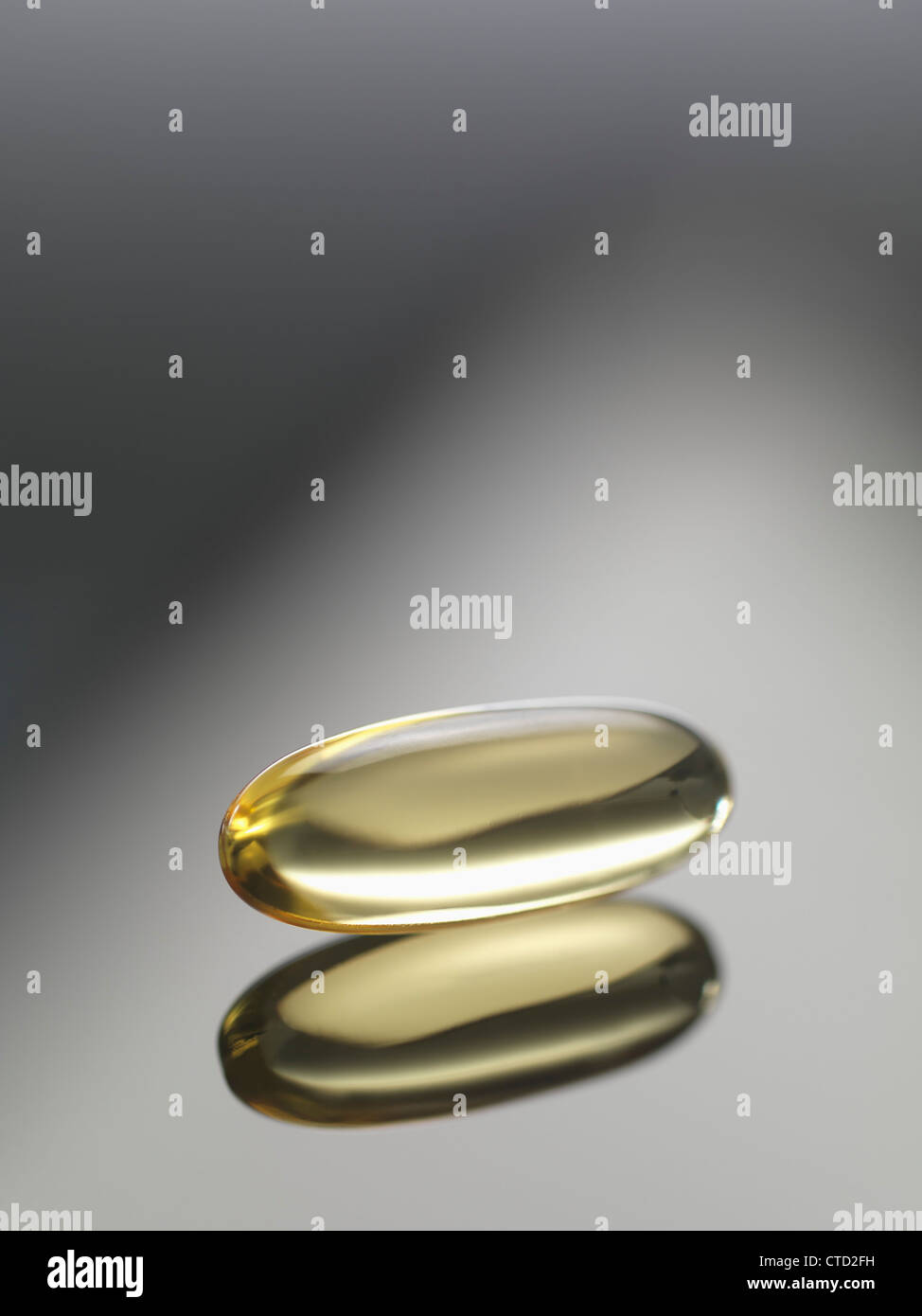 Cod liver oil capsule Stock Photo - Alamy