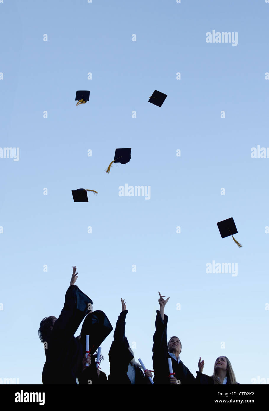 Graduate throwing mortarboard hi-res stock photography and images - Alamy