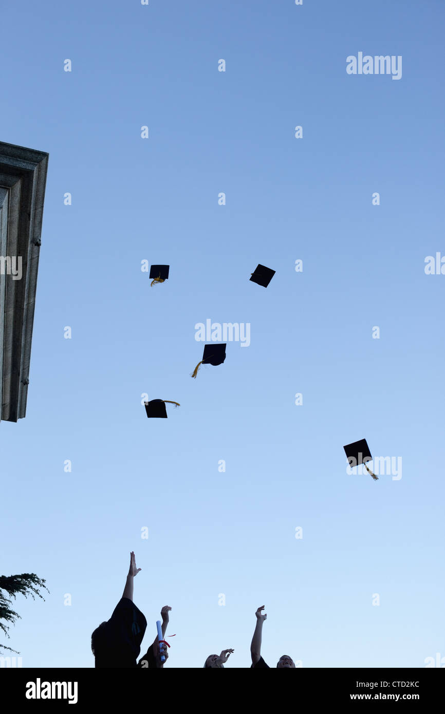 Graduate throwing mortarboard hi-res stock photography and images - Alamy