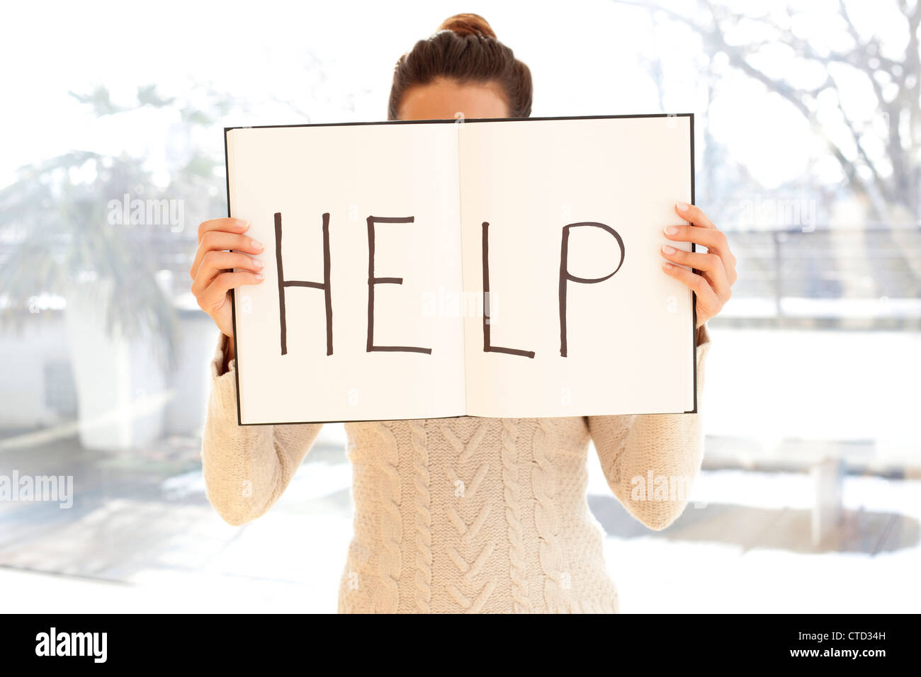 Woman asking for help Stock Photo - Alamy