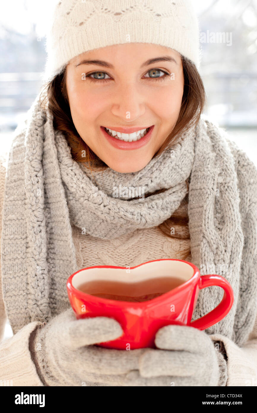 Happy woman in cold weather Stock Photo - Alamy