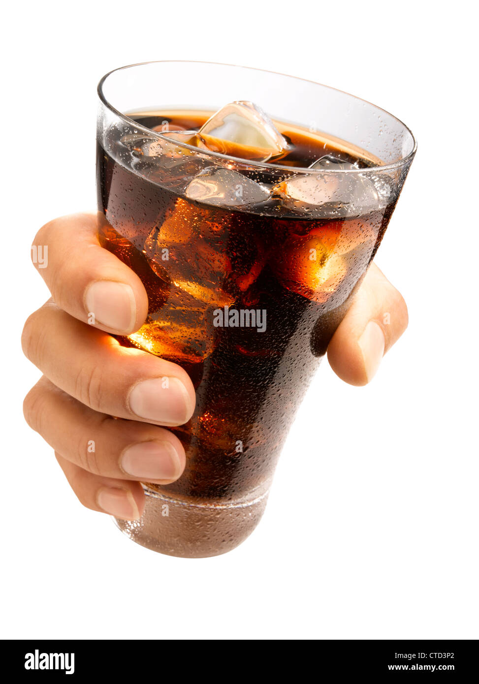 Hand holding a wet glass ice cold cola with ice cubes in it Stock Photo ...