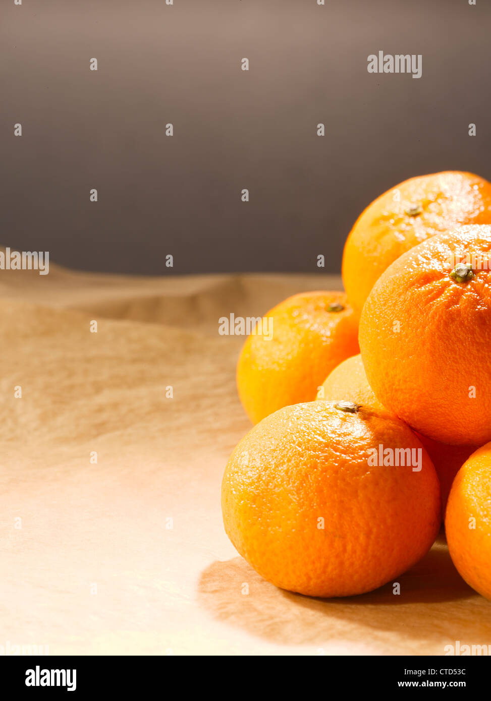 manderin on table to some text on the left Stock Photo - Alamy