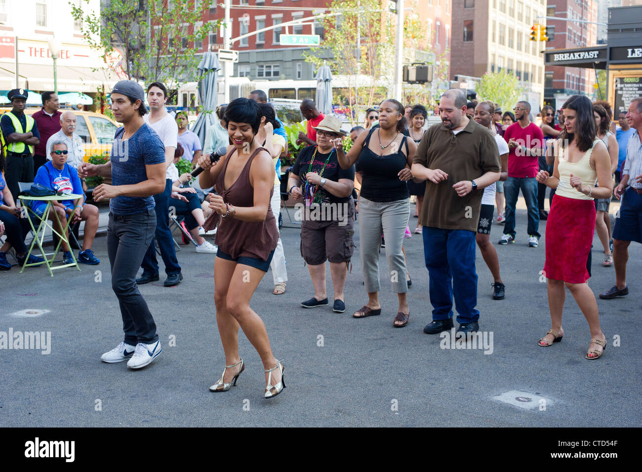 Salsa dancing group daytime hi-res stock photography and images - Alamy