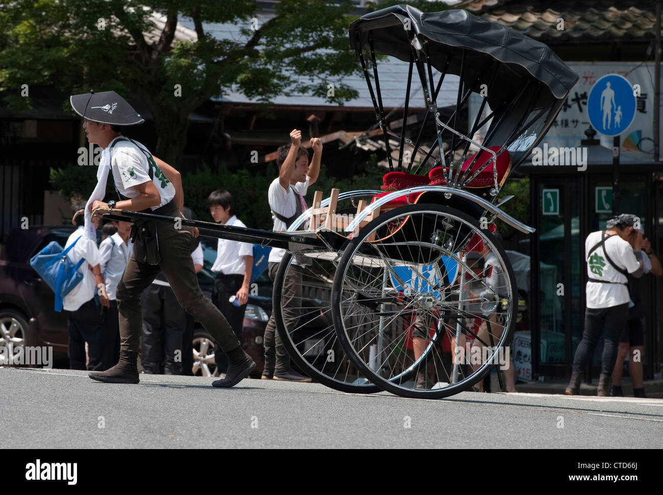 A rickshaw-puller wearing jika-tabi, split-toed work boots (Nara, Japan ...