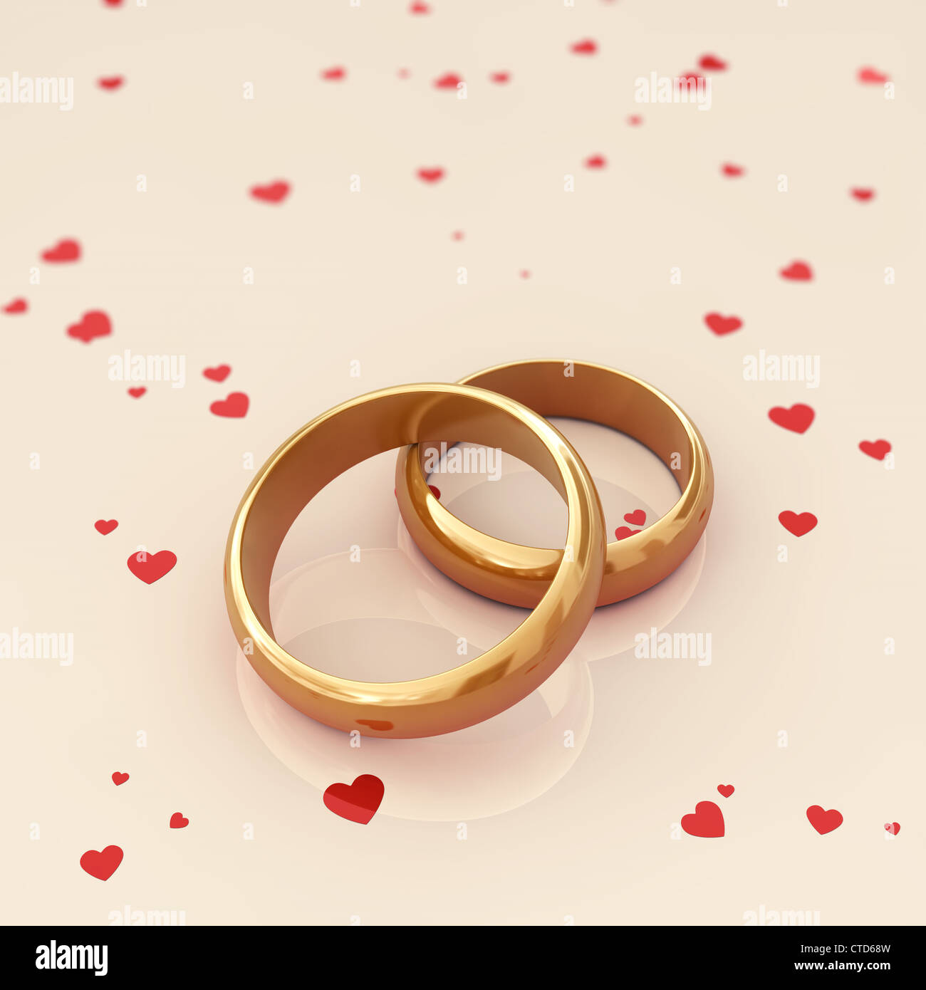 Golden wedding rings on beige background with red hearts Stock Photo ...