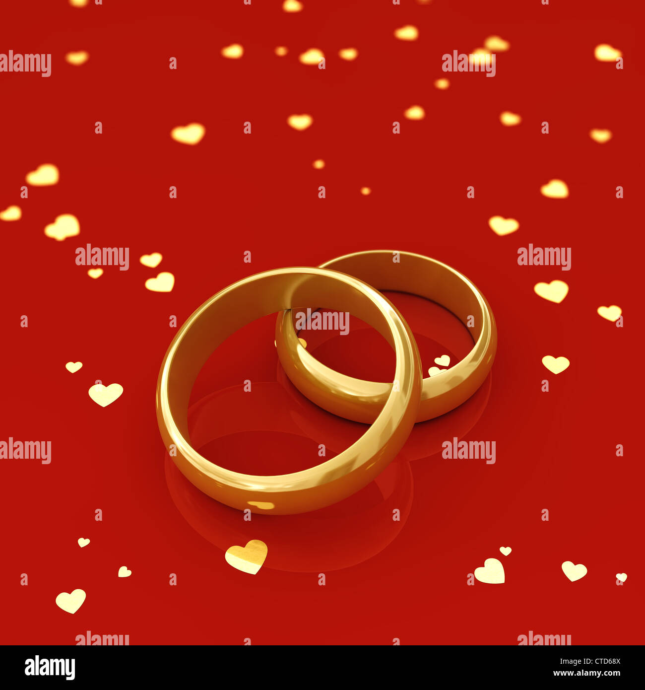 Golden wedding rings and hearts on red background Stock Photo - Alamy