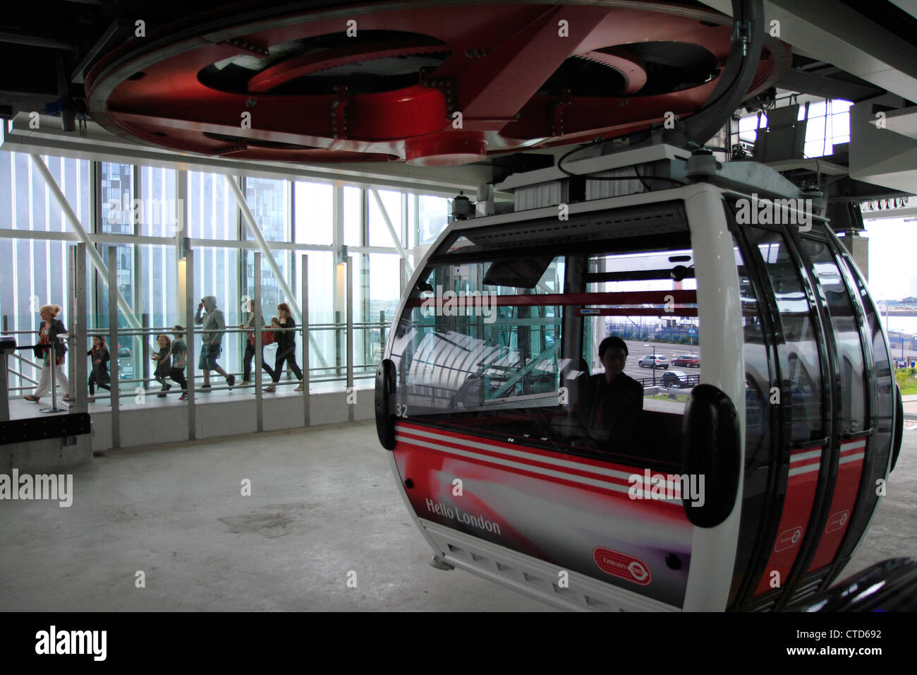 Emirates Air Line cable car entering Greenwich Peninsula terminal ...