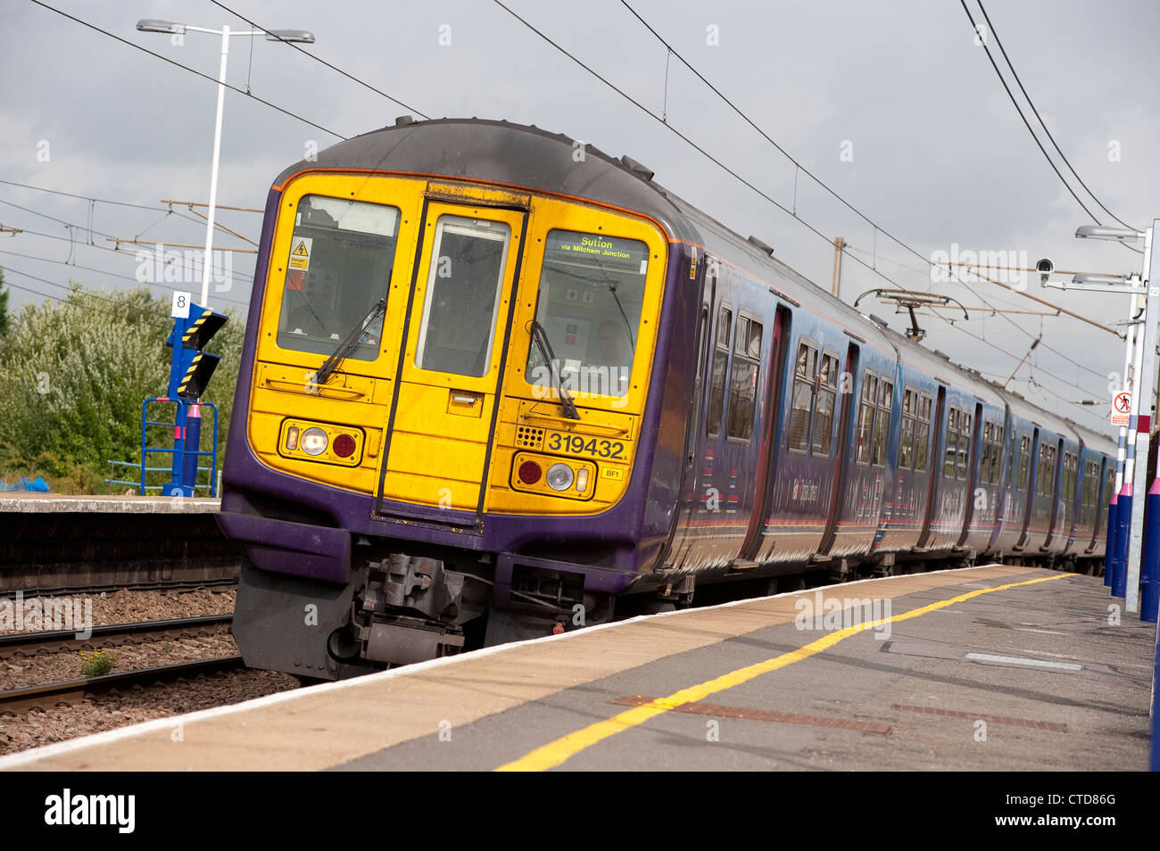Class 319 passenger train in First Capital Connect livery approaching a ...