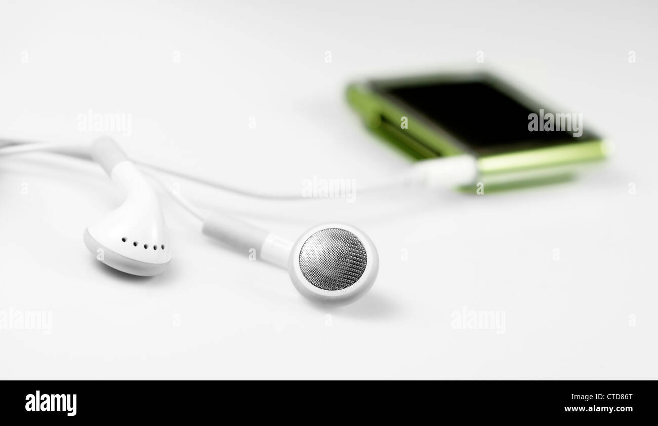 green MP3 player with headphone Stock Photo - Alamy