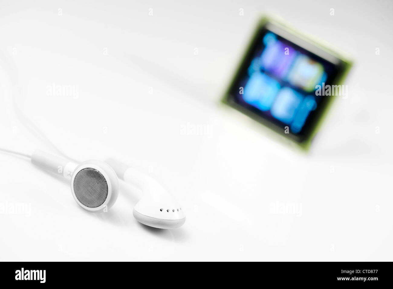 green MP3 player with headphone Stock Photo - Alamy