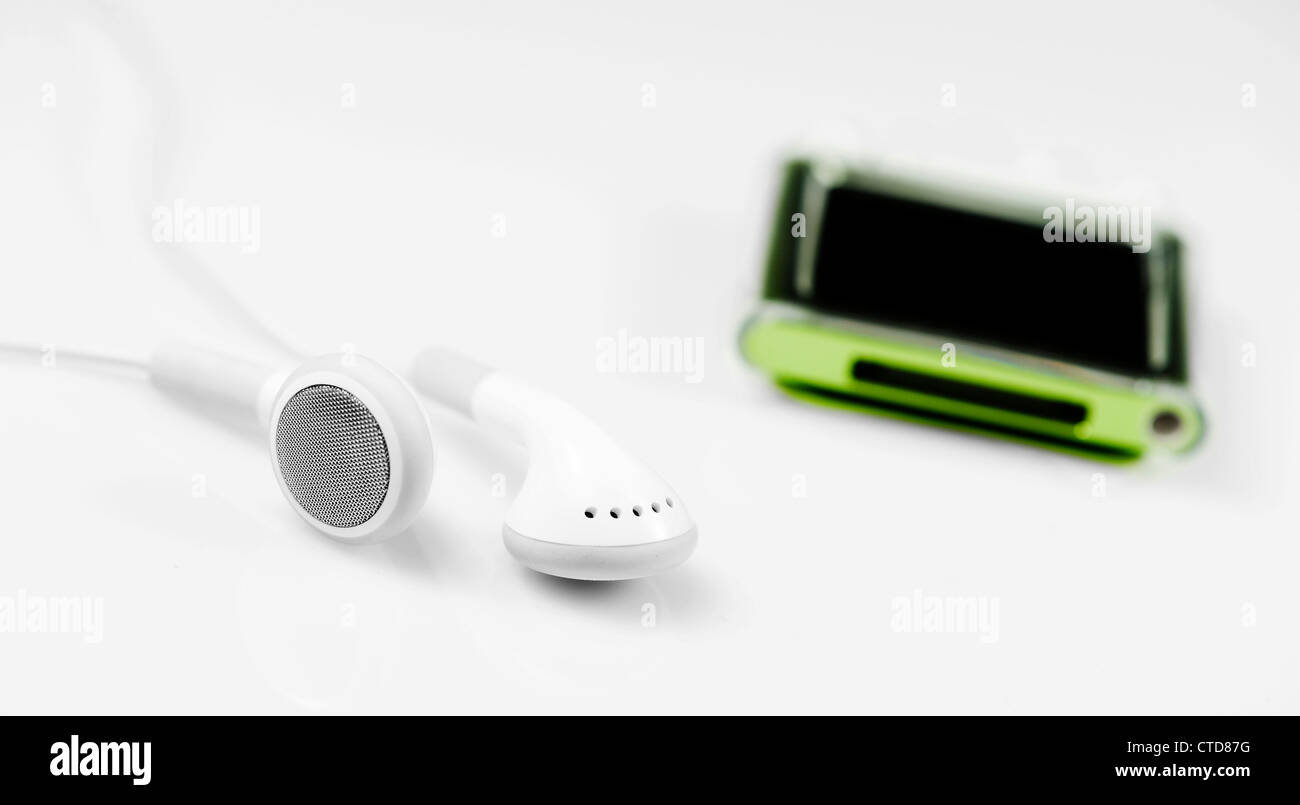 green MP3 player with headphone Stock Photo - Alamy
