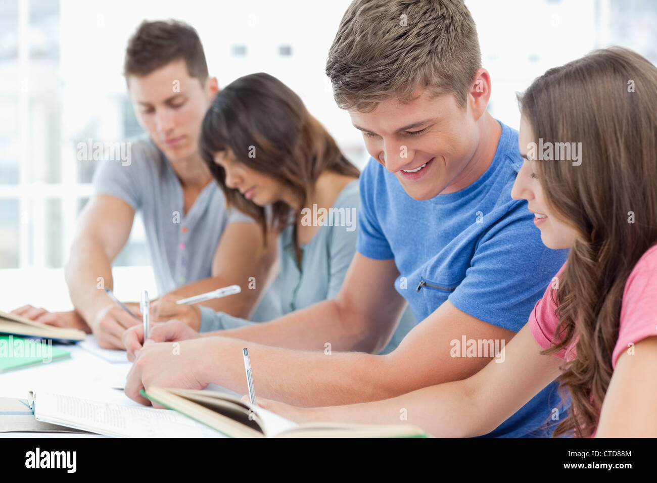 Helping each other group hi-res stock photography and images - Alamy