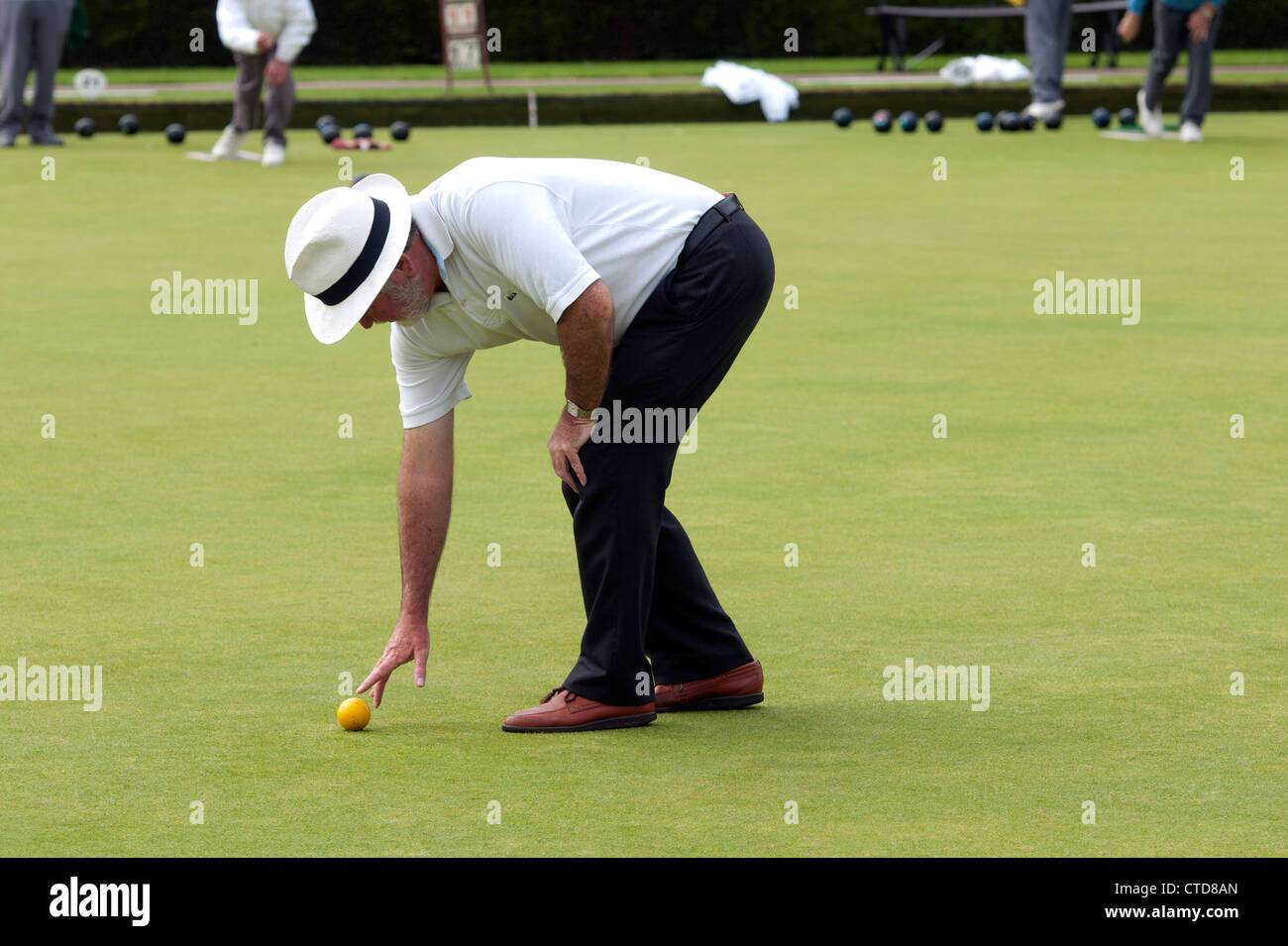 Men`s bowls, player adjusting position of jack Stock Photo - Alamy