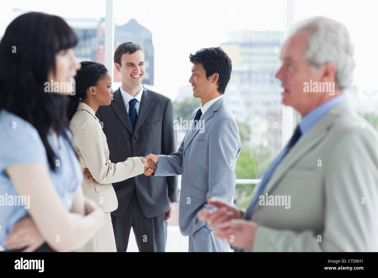 Business people shaking hands after talking to each other Stock Photo ...