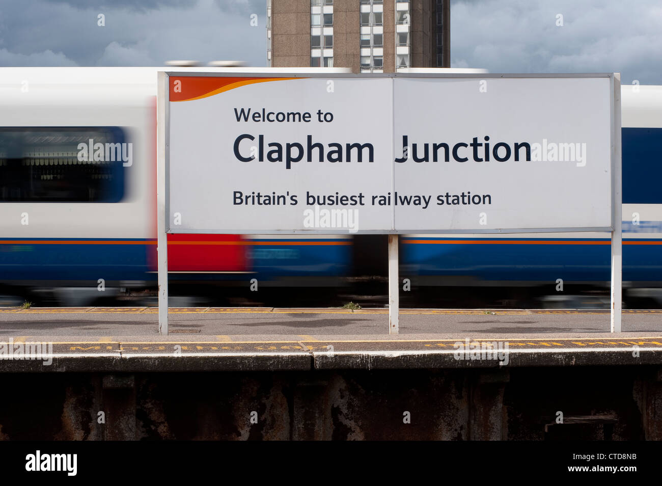 Welcome sign on the platform of Clapham Junction Station, with train ...