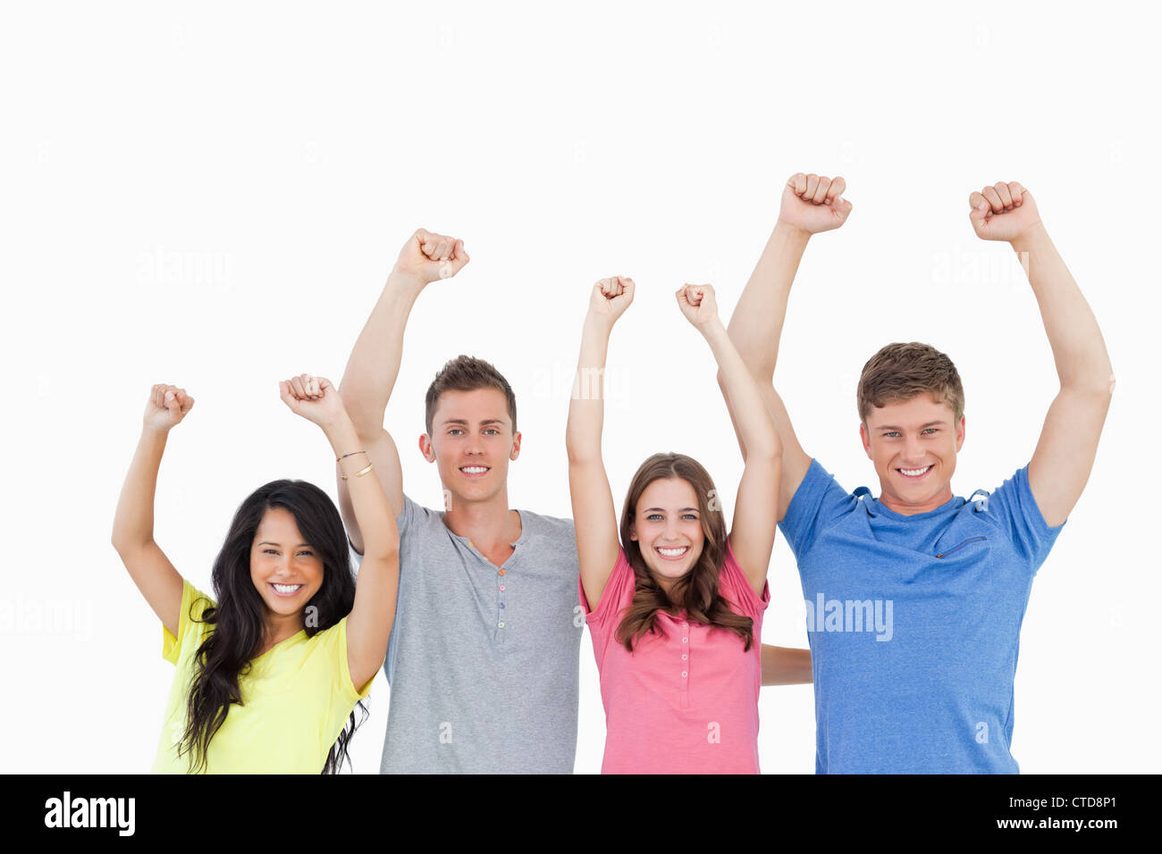 A smiling group of people looking at the camera and celebrating Stock ...