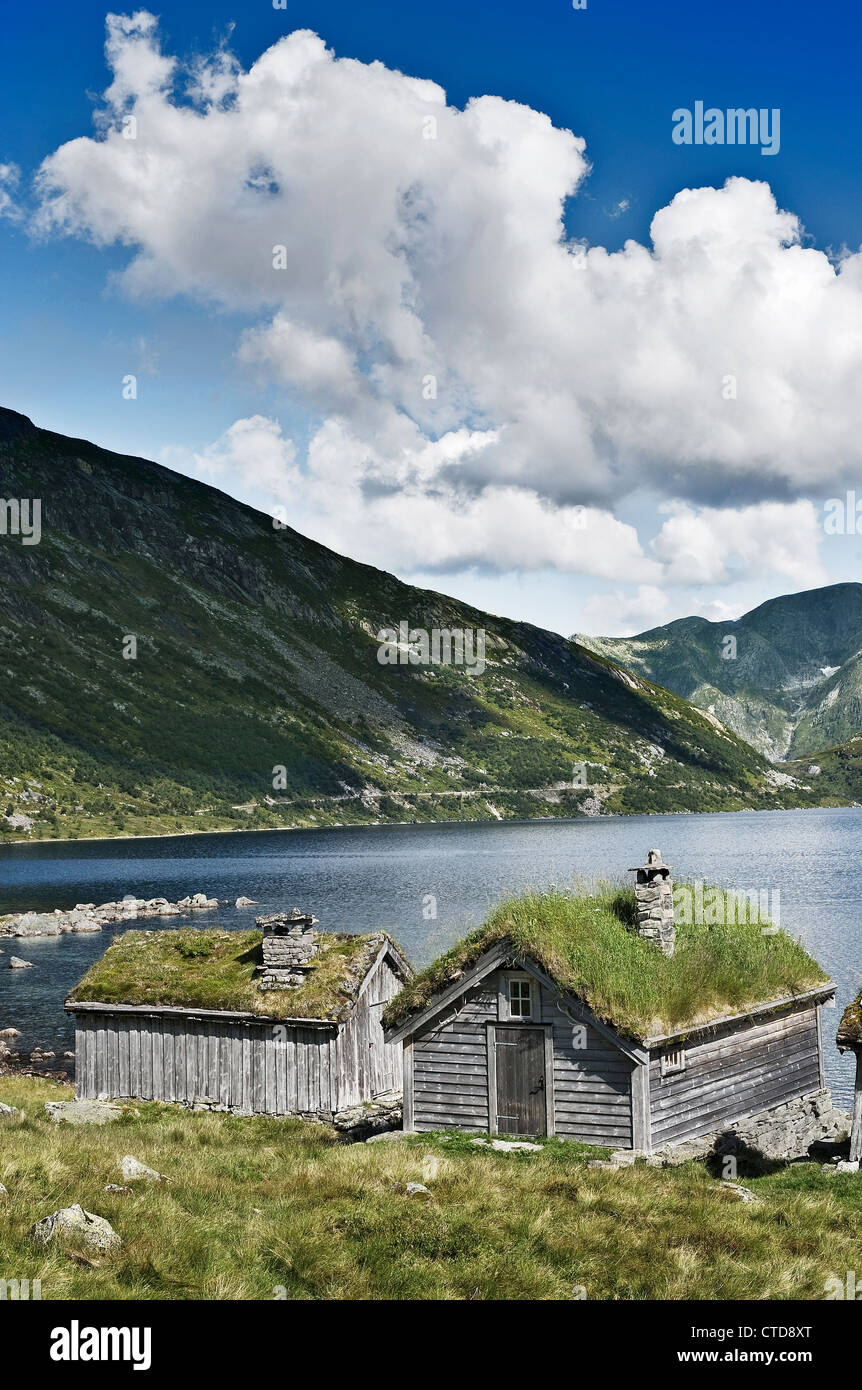 Norwegian huts near a mountain lake Stock Photo - Alamy