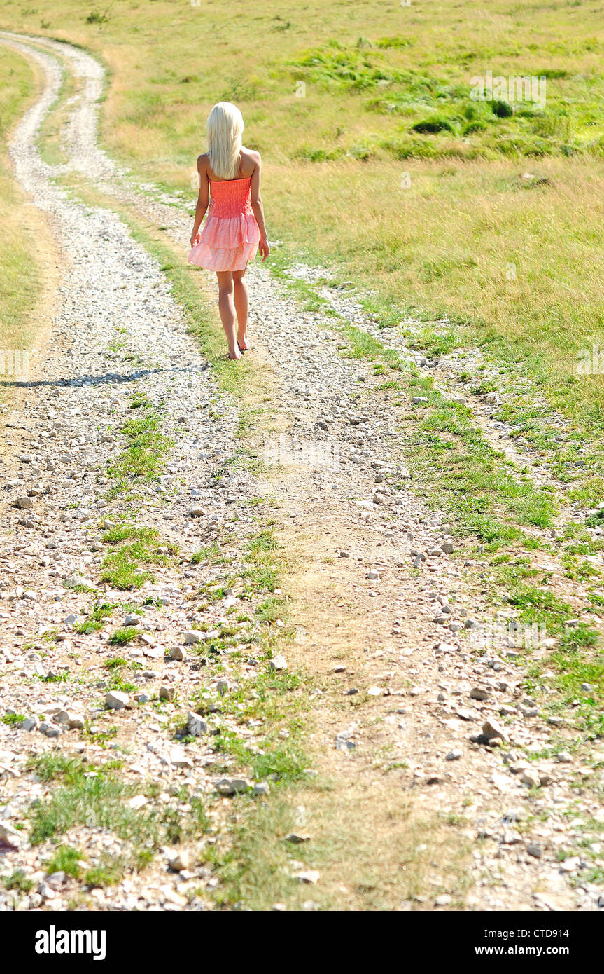 Young girl leave alone in nature Stock Photo - Alamy