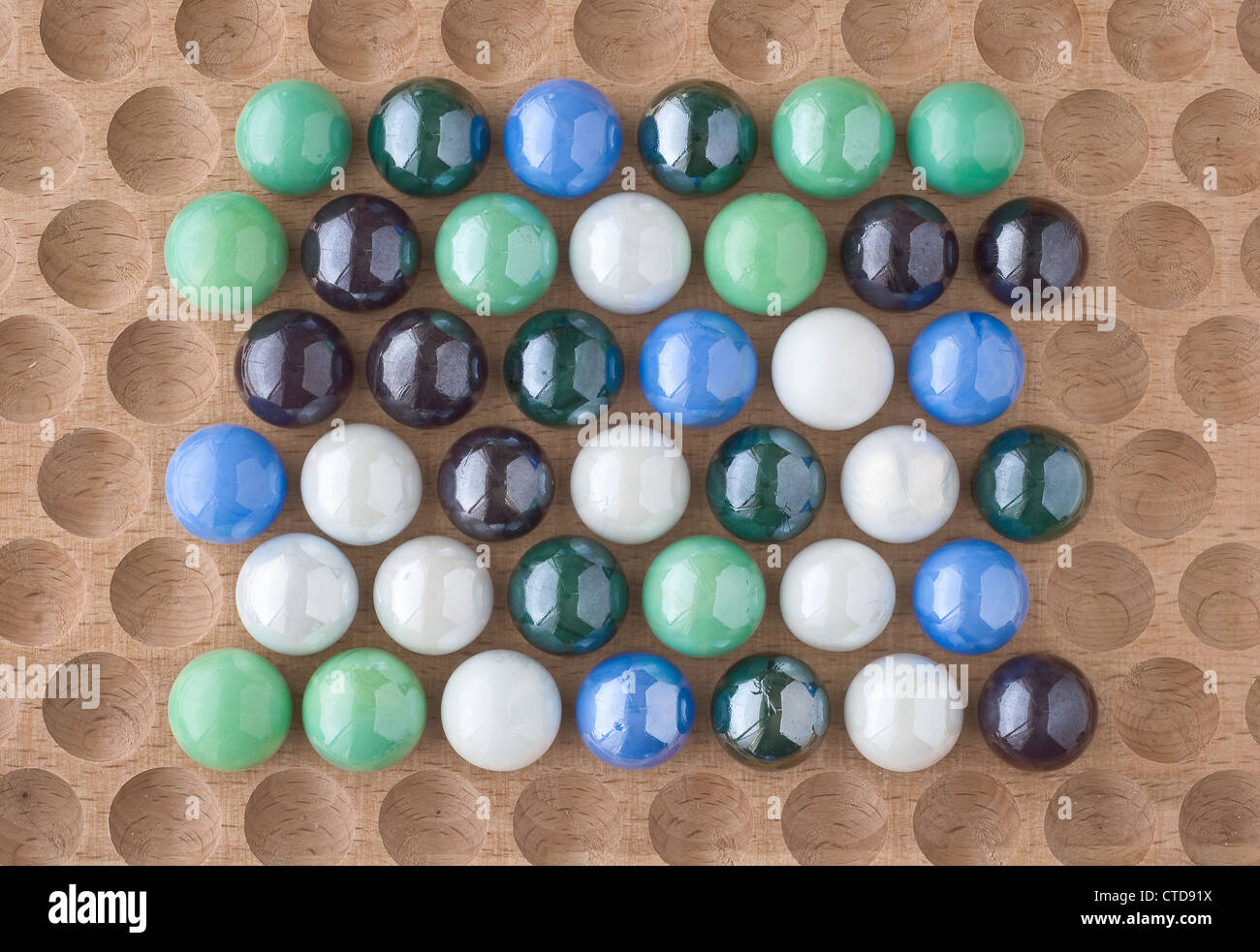 Arrangement of Marbles as Design Elements on Wood Stock Photo - Alamy