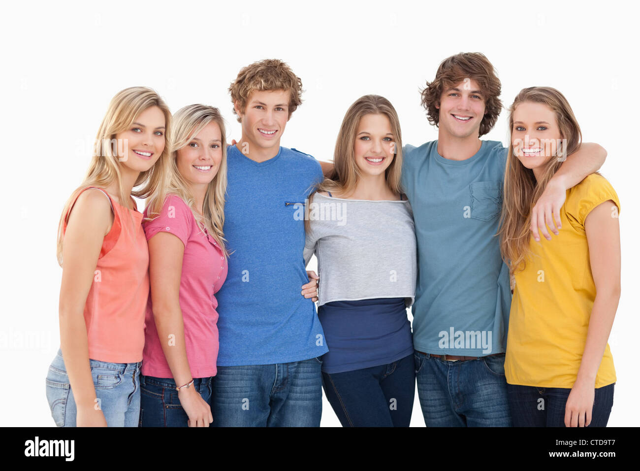 A group of friends smiling and holding each other Stock Photo - Alamy
