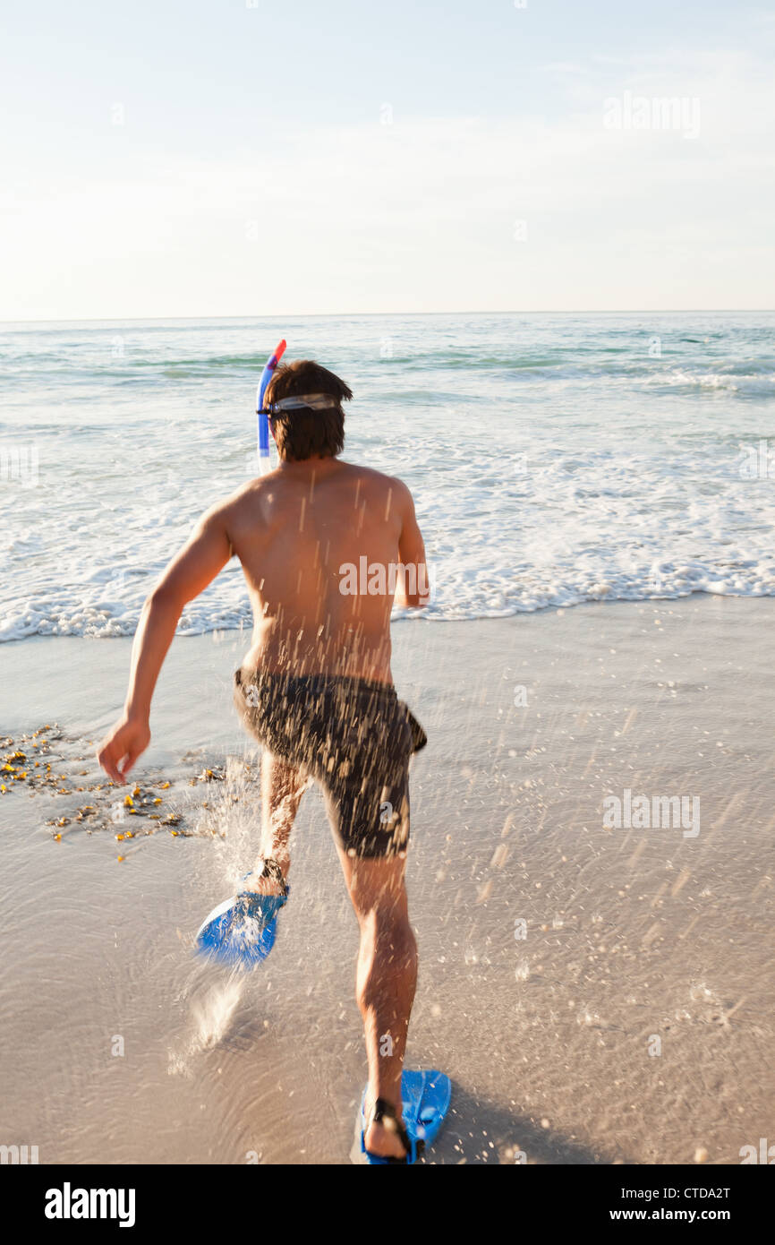 Man running in ocean swim hi-res stock photography and images - Alamy