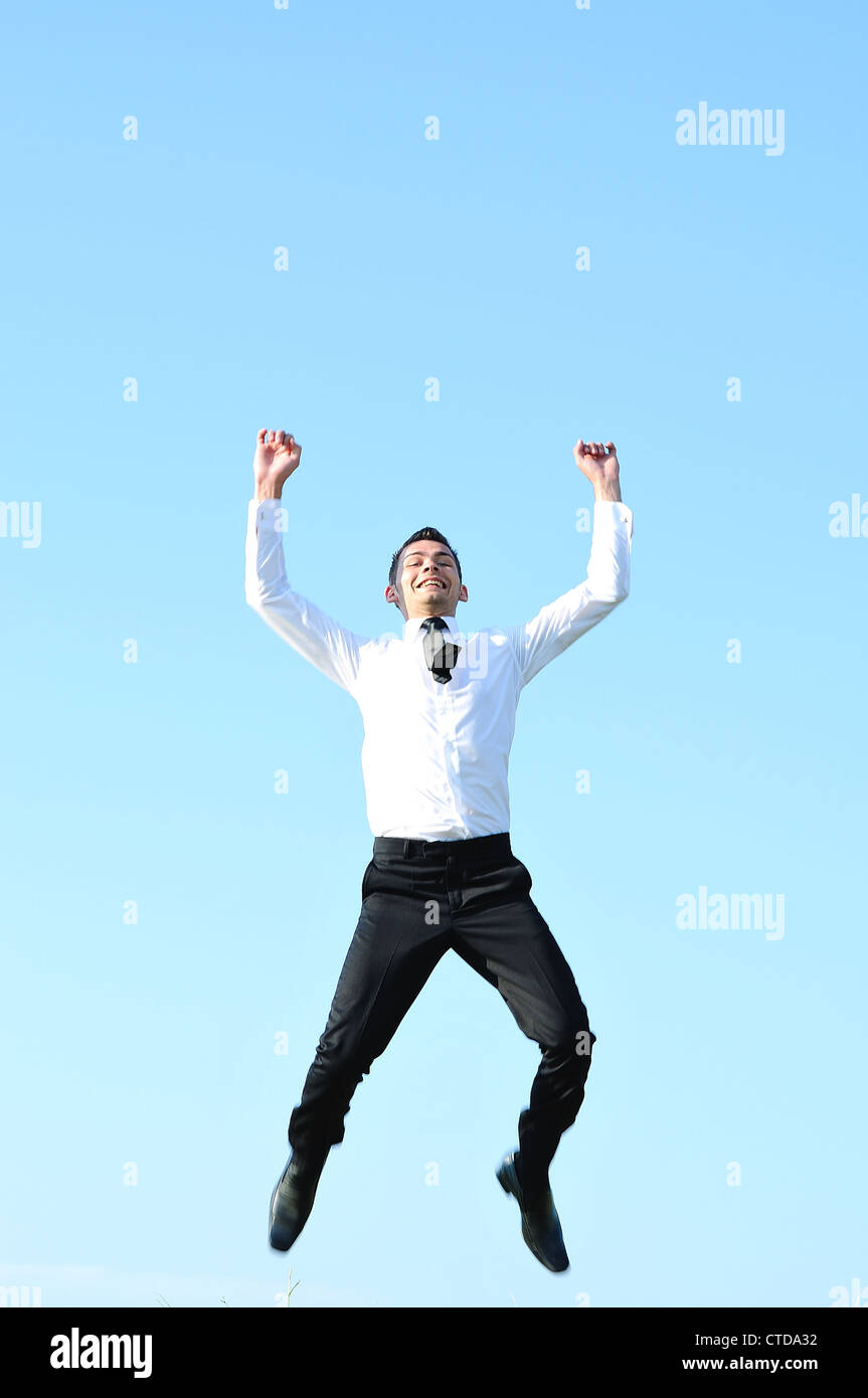 Business man happy jump outside hi-res stock photography and images - Alamy