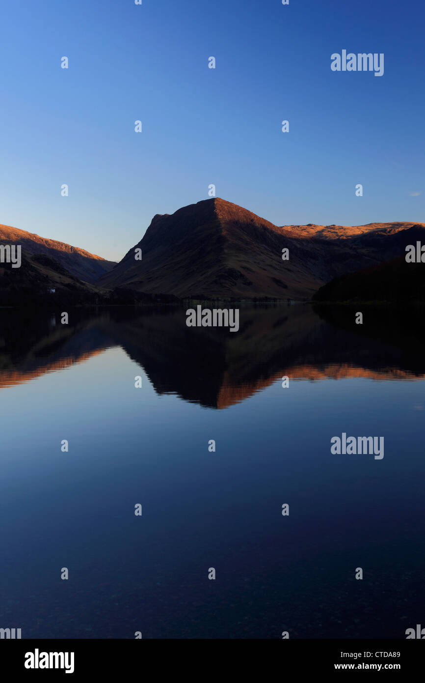 Sunset Autumn colours Fleetwith Pike fell, reflected in Buttermere ...