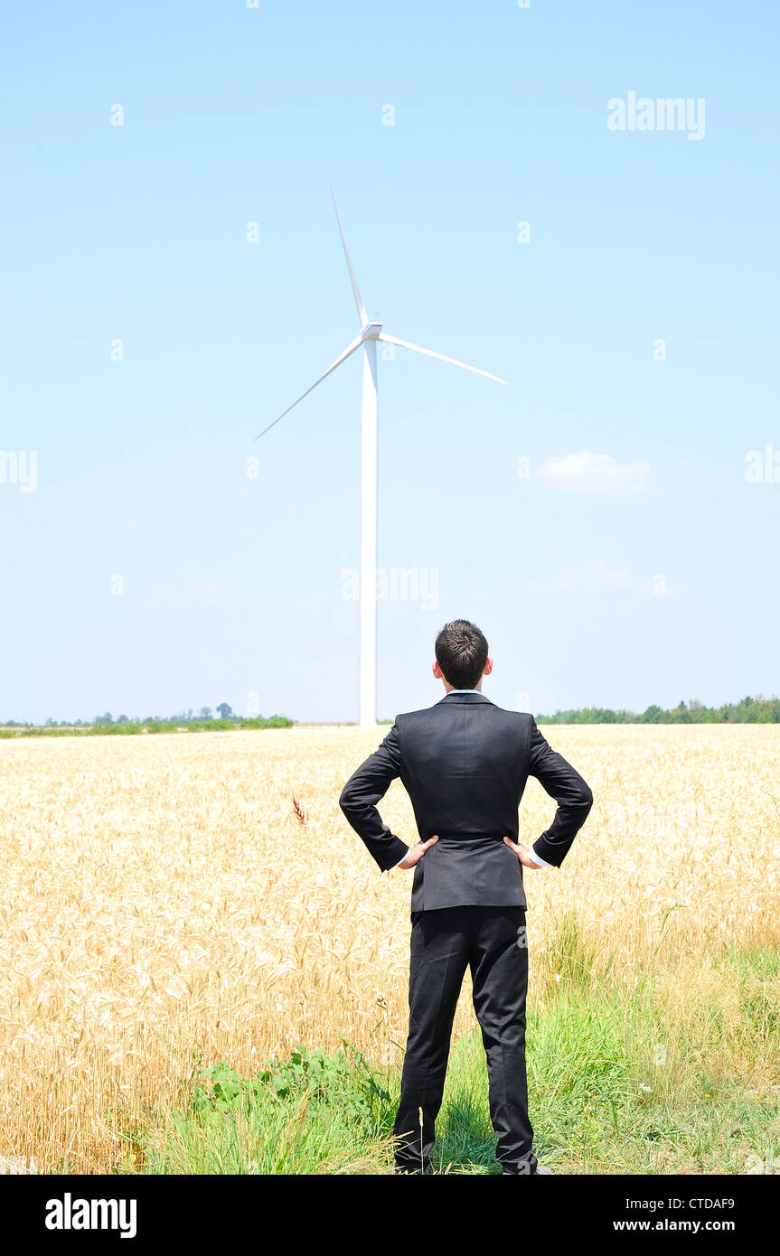 Business man at wind farm Stock Photo - Alamy