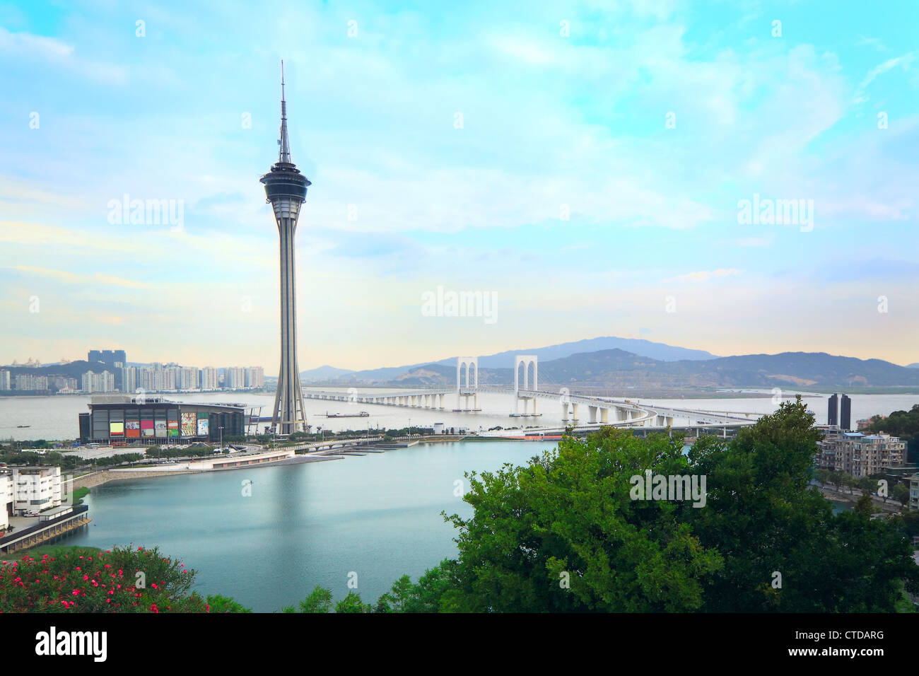 Urban landscape of Macau with famous traveling tower under blue sky ...