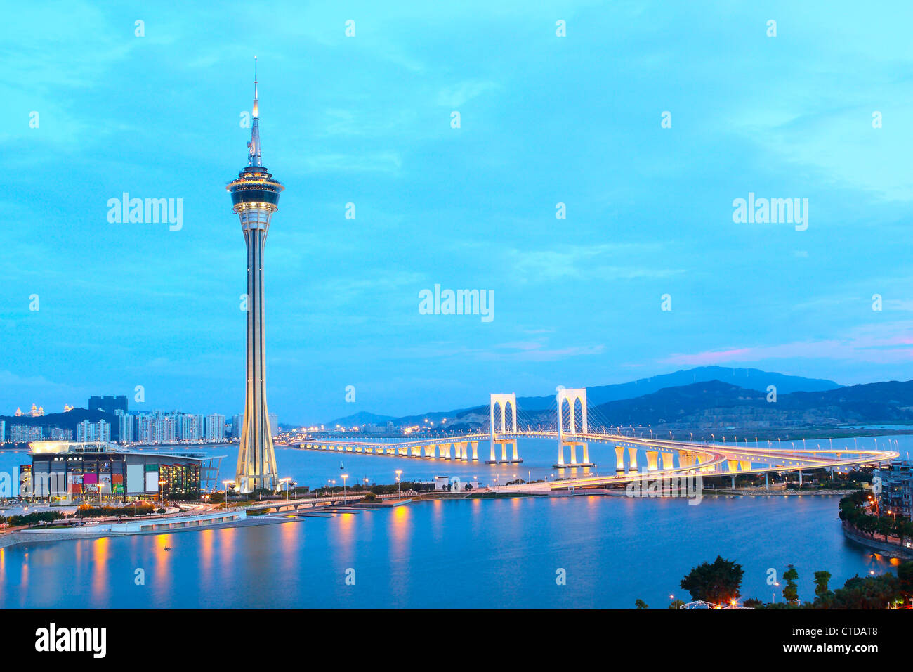 Urban landscape of Macau with famous traveling tower under blue sky ...