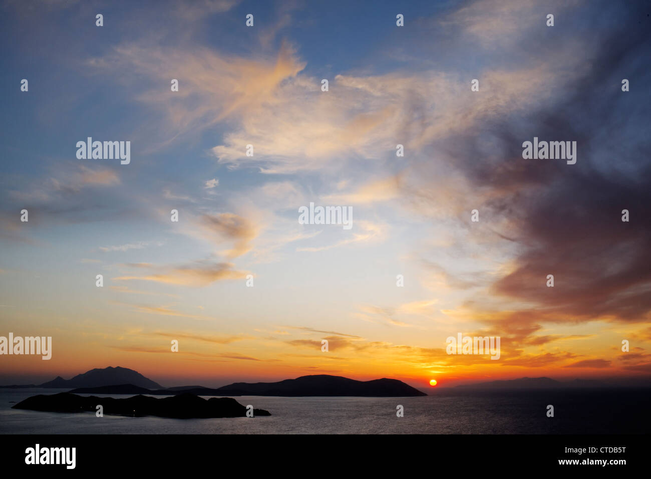 Beautiful sunset on greek sea Stock Photo - Alamy