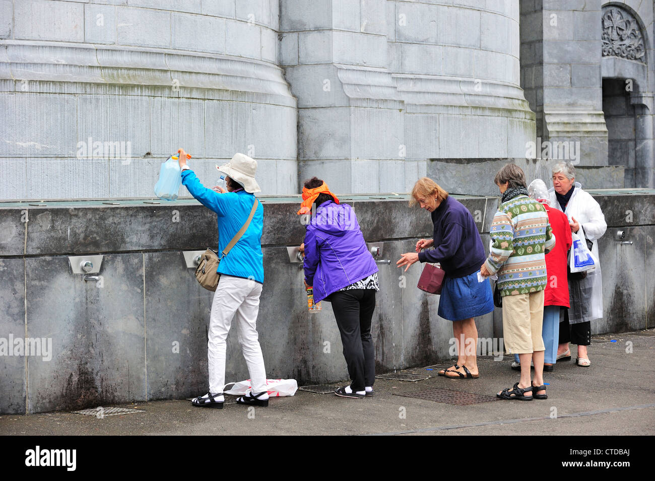 Lourdes pilgrims holy water hi-res stock photography and images - Alamy