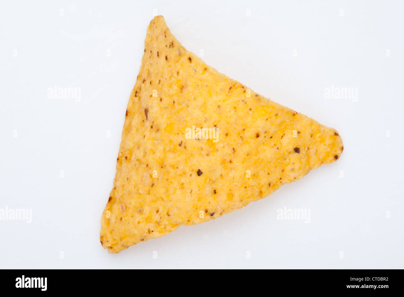 Close up of a triangle nacho Stock Photo - Alamy