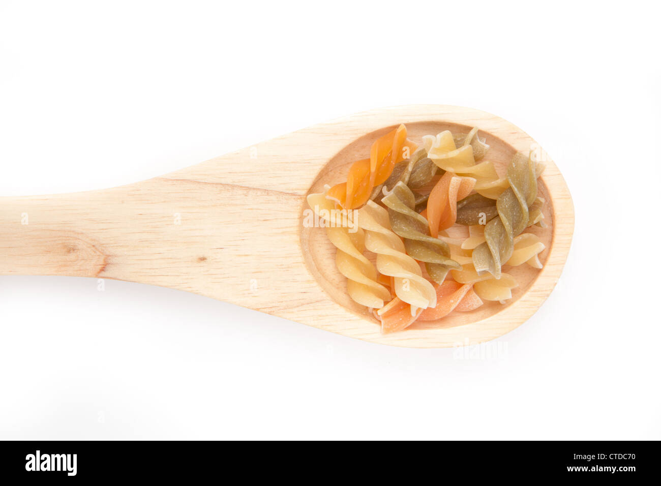 Wooden spoon with pasta Stock Photo - Alamy