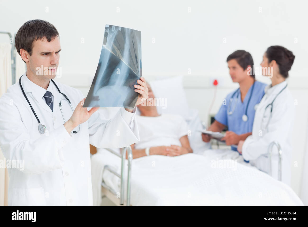 Doctor examining a scan of lungs Stock Photo - Alamy