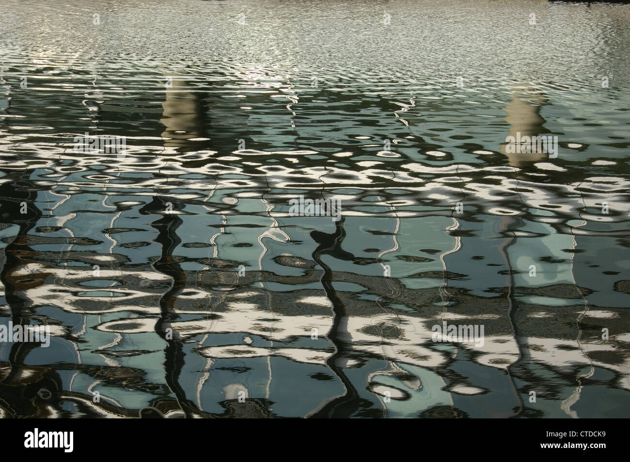 Reflection of building on the canal surface at Paddington in London ...