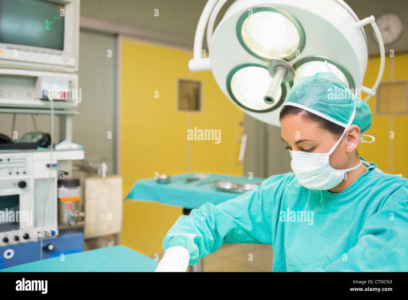Female surgeon next to the operating table Stock Photo - Alamy