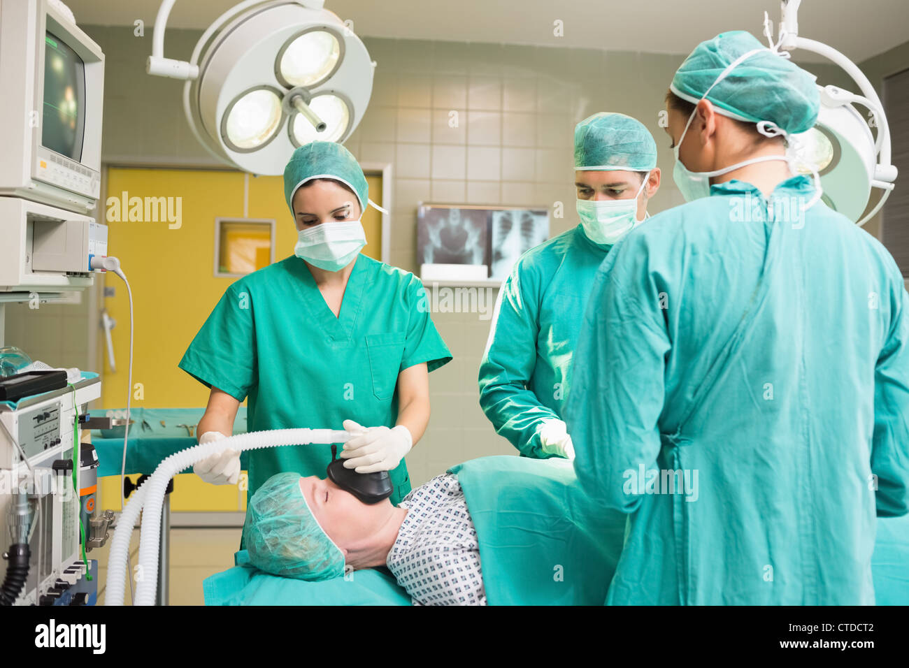 Patient lying on operation table hi-res stock photography and images ...