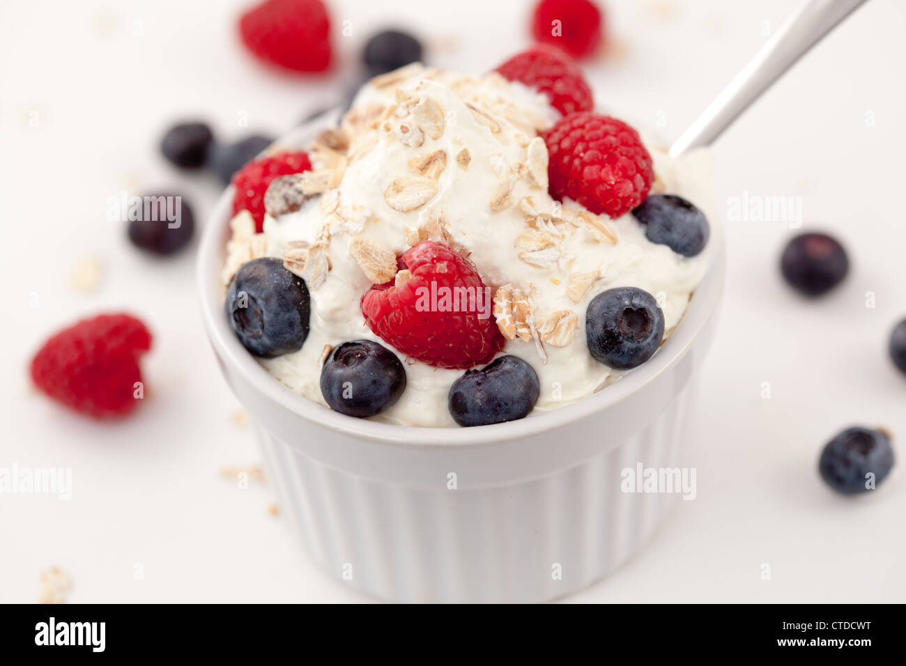 Sweet berries in whipped cream Stock Photo - Alamy