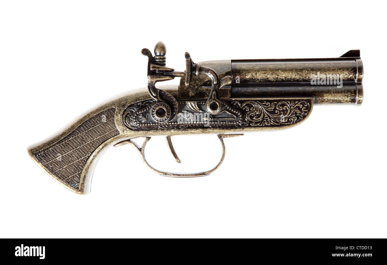 Model of the old gun on the white background, souvenir Stock Photo - Alamy