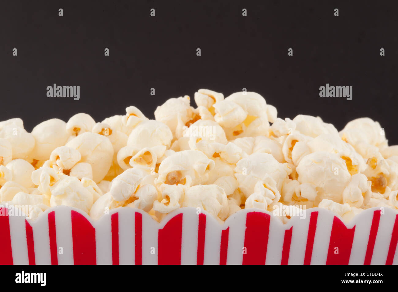 Close up of a top of a box full of pop corn Stock Photo - Alamy