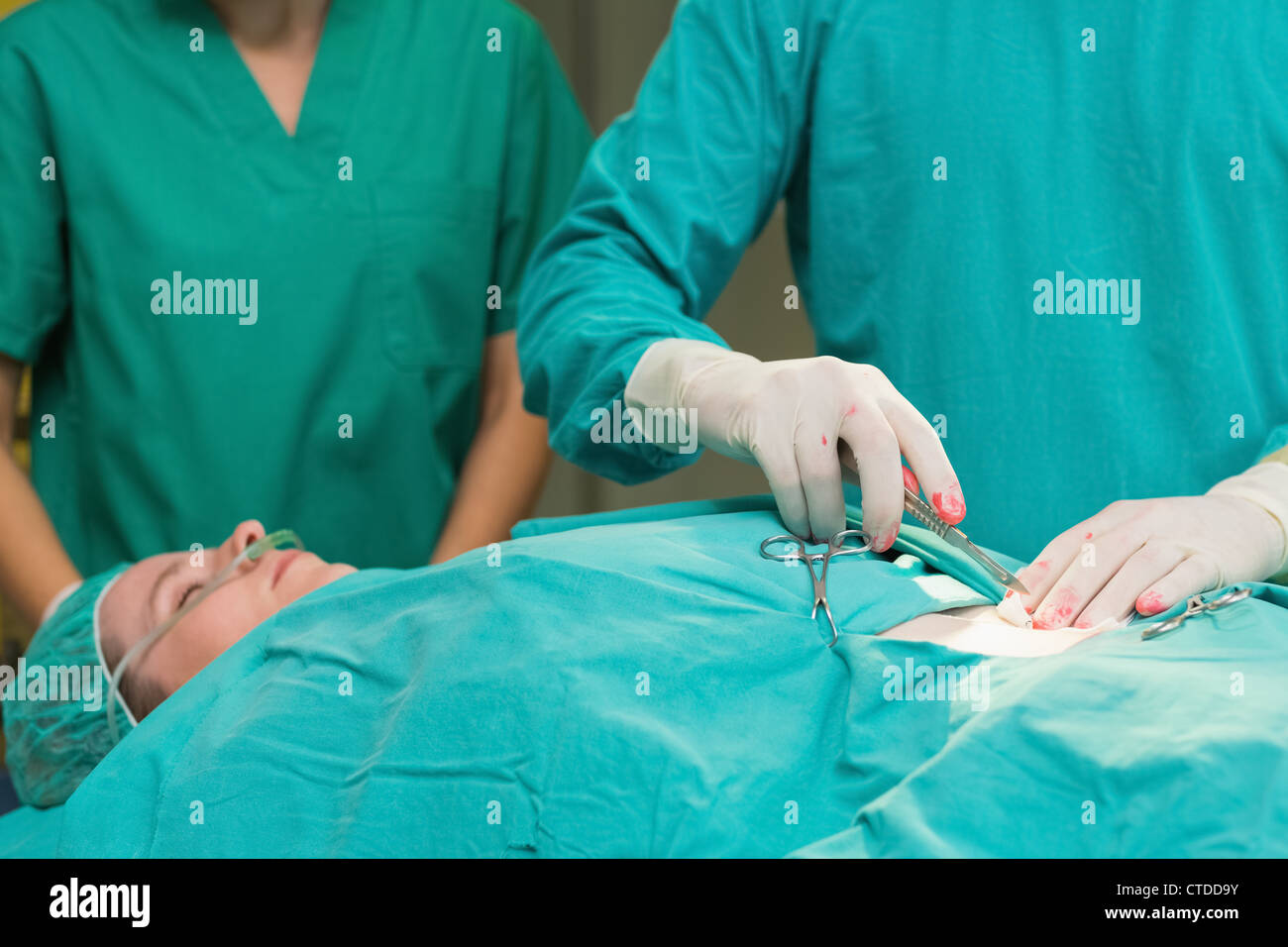 Close up of a surgeon using a surgical tool Stock Photo - Alamy