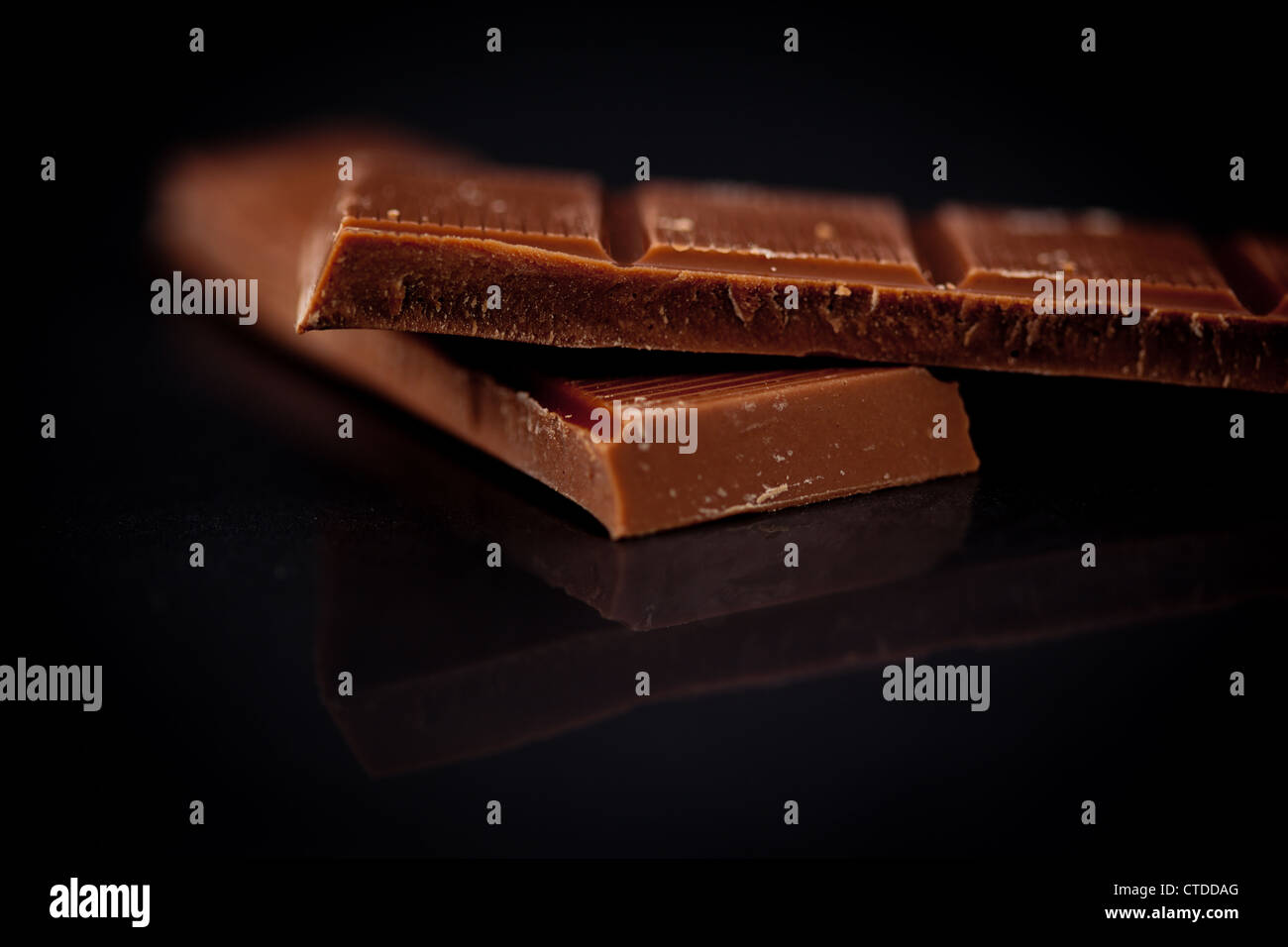 Two blurred bar of dark chocolate Stock Photo - Alamy