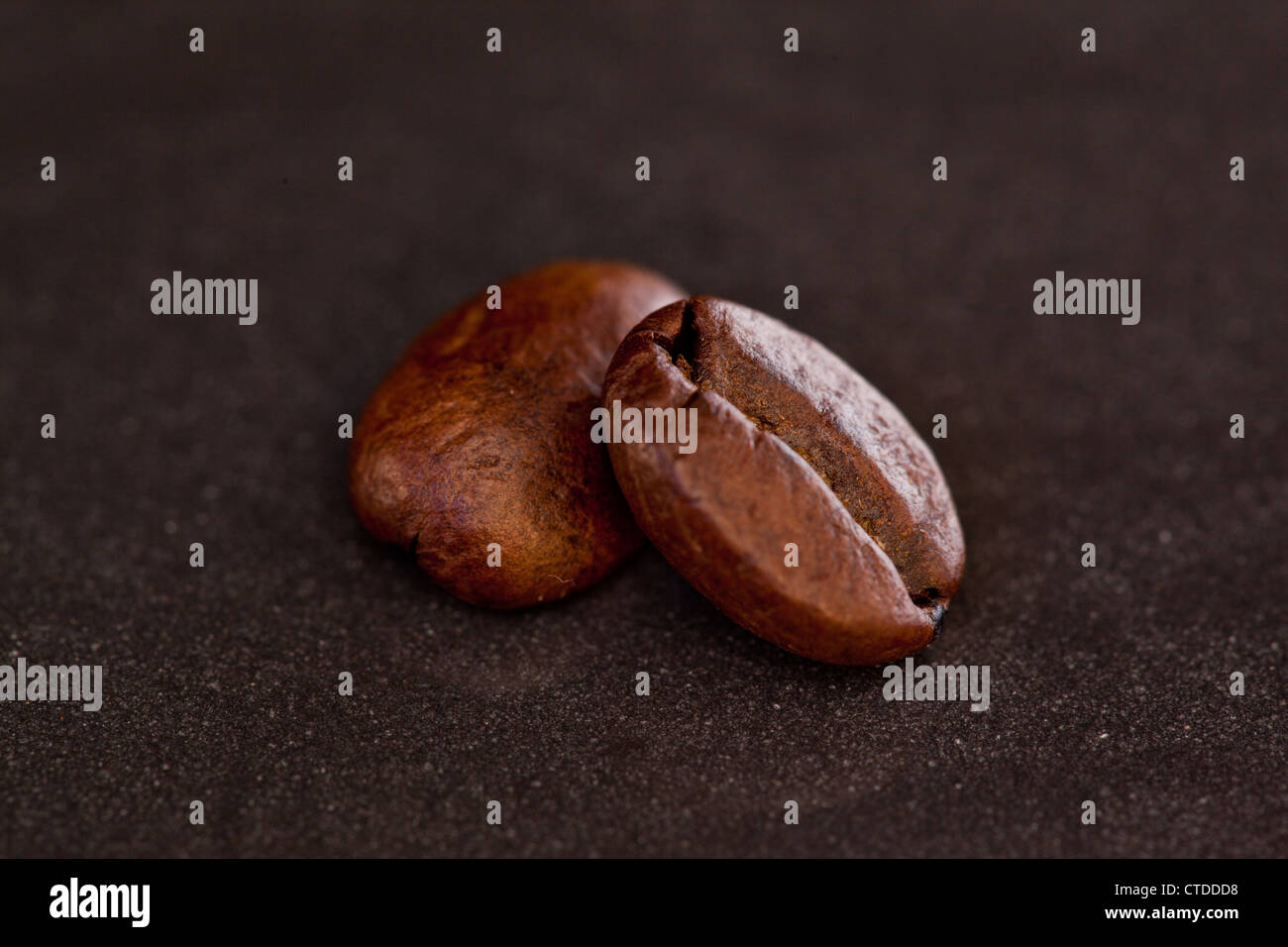 Two coffee beans side by side Stock Photo - Alamy