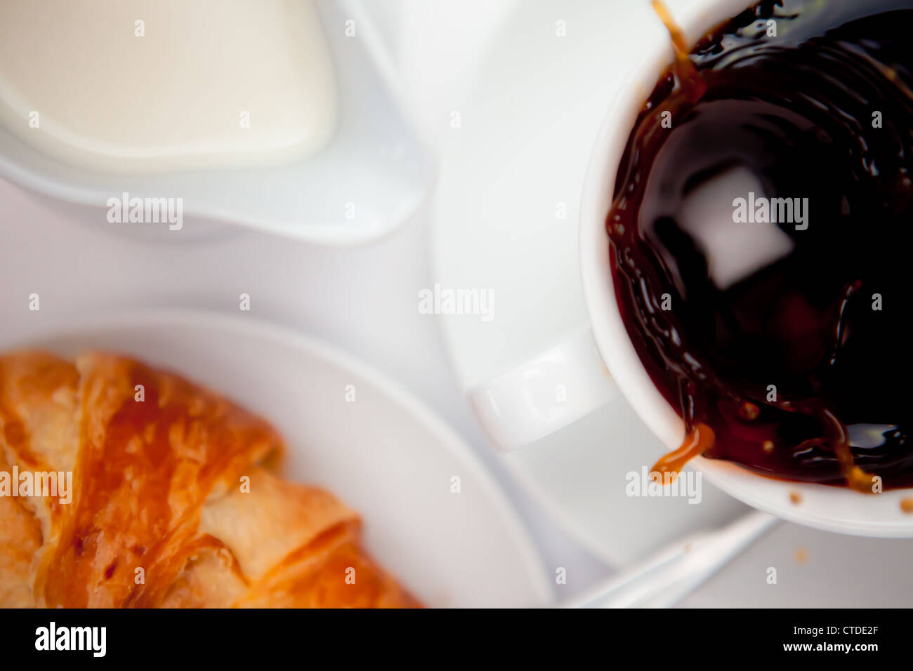 Splashing of coffee Stock Photo - Alamy