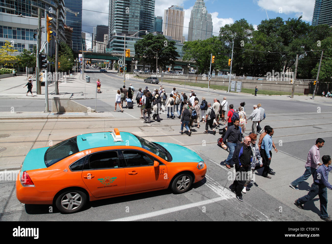 Toronto City Pedestrians Crossing At York And Queens Quay West Near The ...