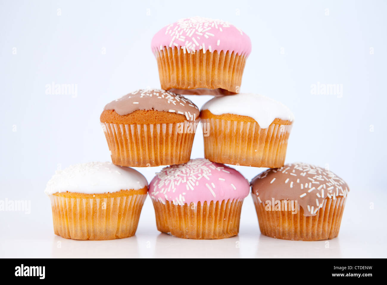 Pyramid of muffins with icing sugar Stock Photo - Alamy