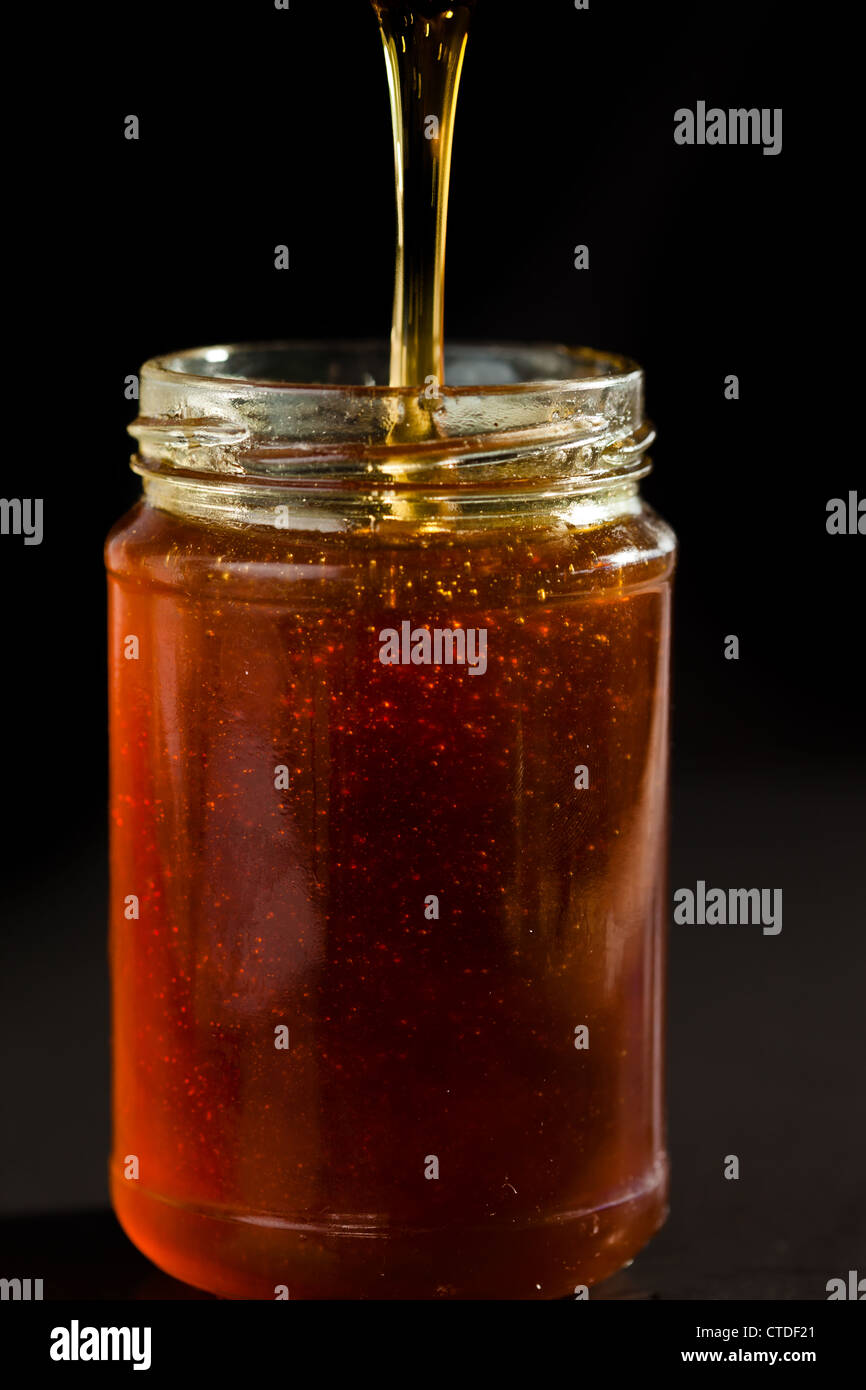 He is dropping honey hi-res stock photography and images - Alamy